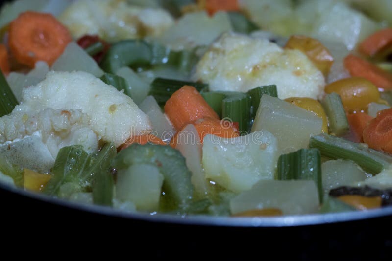 Boiled Cod with Potatoes, Celery and Carrots. Close-up of Pan that ...
