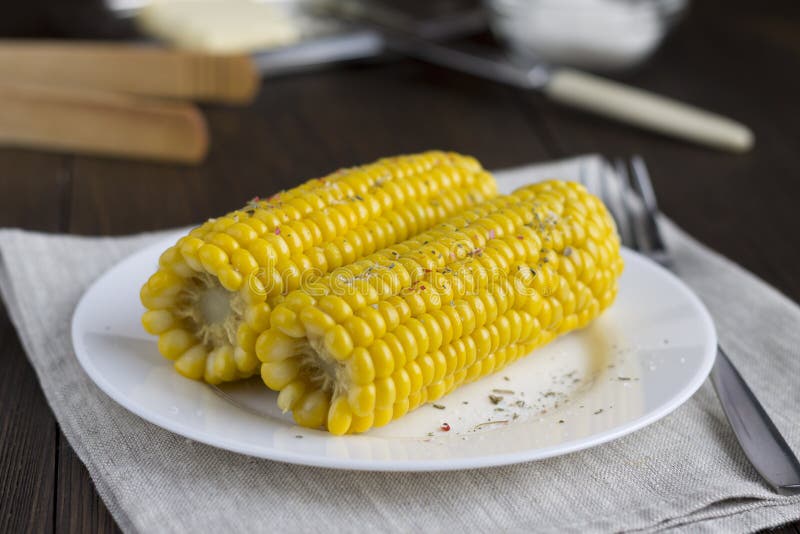 Boiled Corn on the White Plate on the Table. Stock Photo - Image of ...