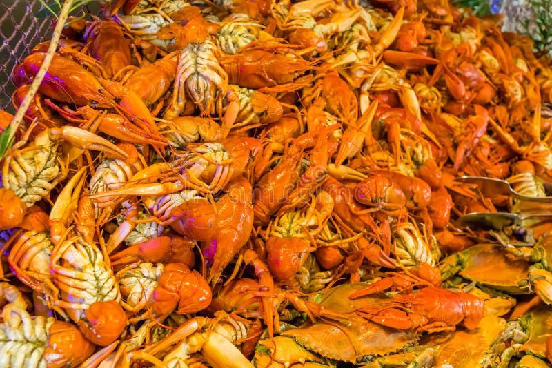 Boiled crawfish and crabs stock image. Image of meat - 127202015