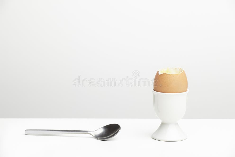 Boiled egg and spoon stock image. Image of dairy, yolk - 29675989
