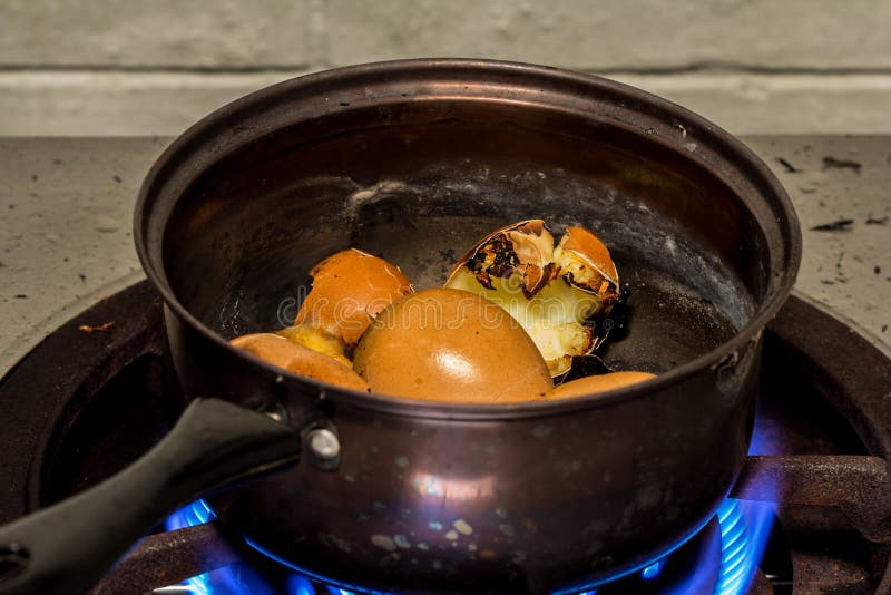 Boiled eggs and burning stock photo. Image of dipper - 67601544