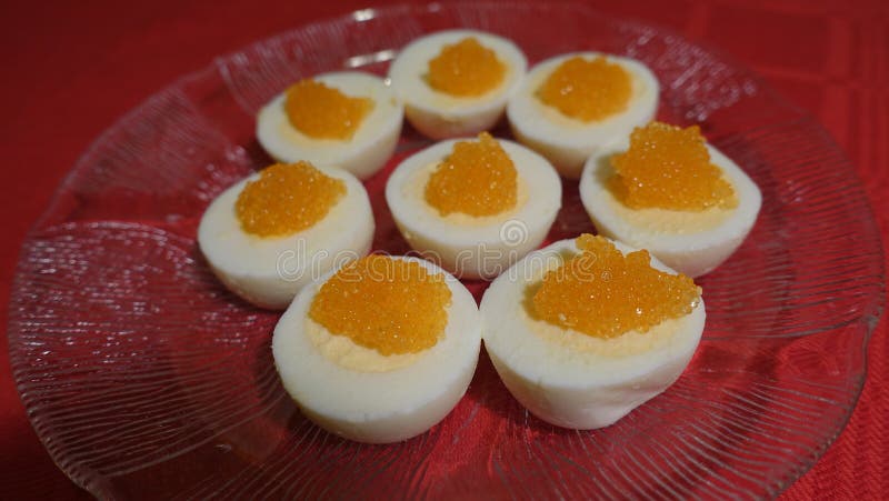 Boiled Eggs with Fish Roe Served on a Glass Plate Stock Photo - Image ...