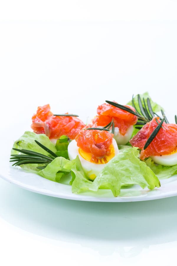 Boiled Eggs with Salted Red Fish and Salad Leaves Stock Photo - Image ...