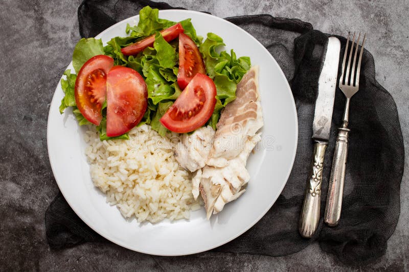 Boiled Fresh Fish with Boiled Rice and Fresh Salad Stock Photo - Image ...