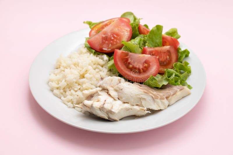 Boiled Fresh Fish with Boiled Rice and Fresh Salad Stock Photo - Image ...