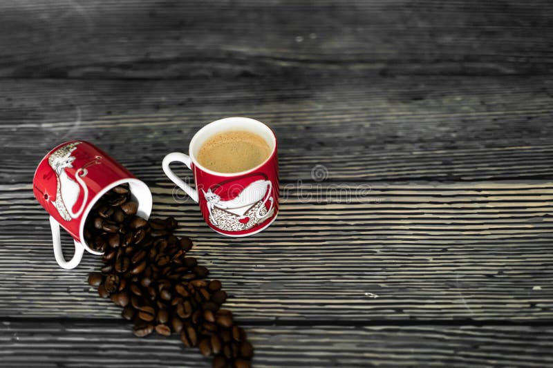 Two Small Red Coffee Cups on a Dark Background Stock Image - Image of ...