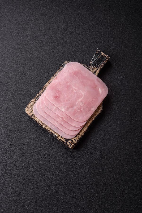 Boiled Ham Cut into Square Slices with Sorrel and Spices Stock Image ...