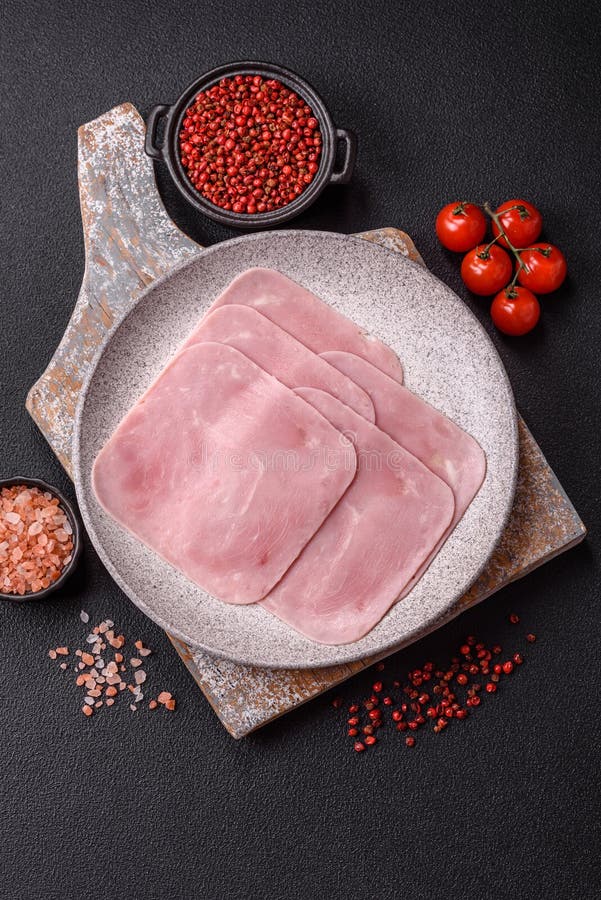 Boiled Ham Cut into Square Slices with Sorrel and Spices Stock Image ...