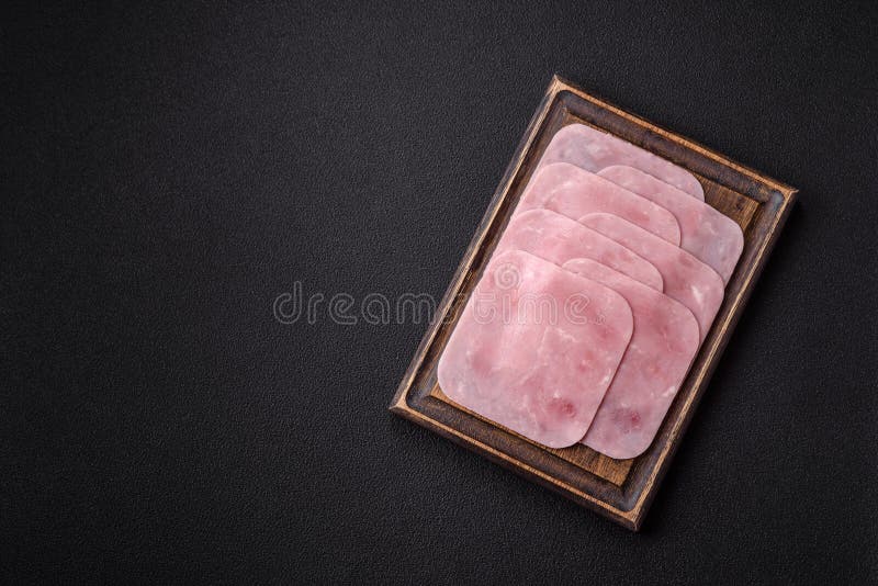 Boiled Ham Cut into Square Slices with Sorrel and Spices Stock Image ...