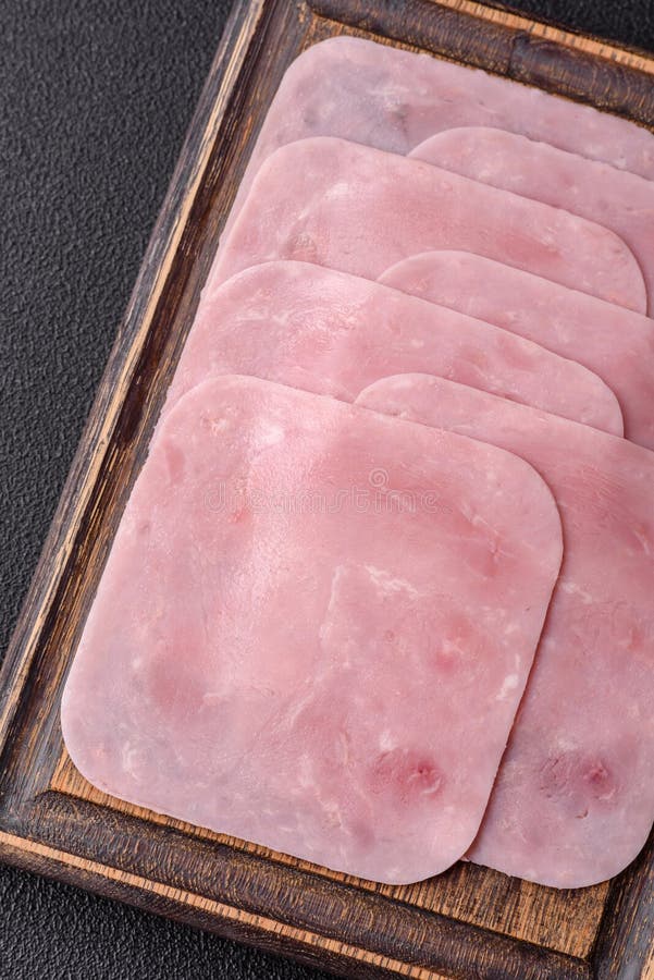 Boiled Ham Cut into Square Slices with Sorrel and Spices Stock Image ...