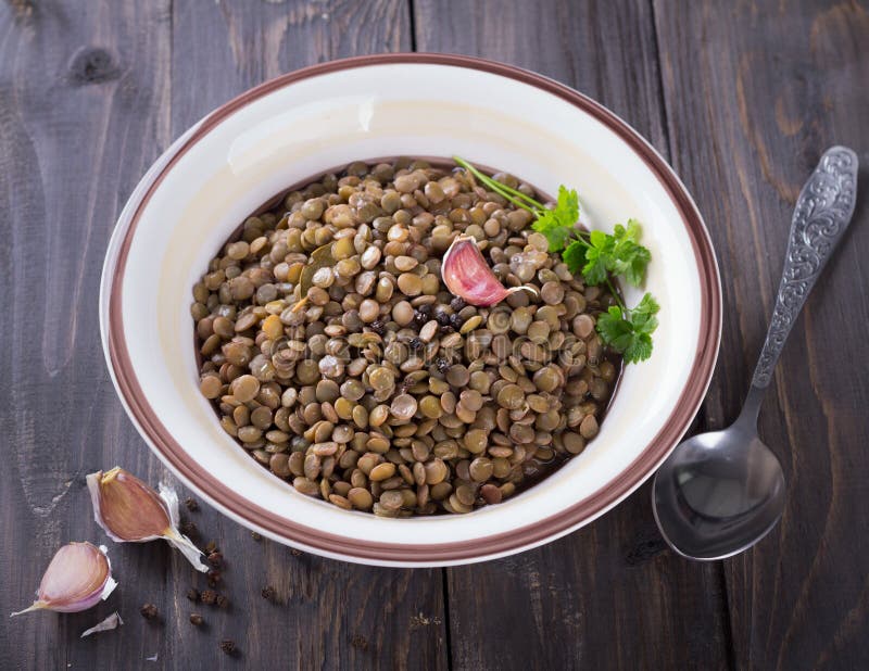 Boiled Lentils in a Bowl with Garlic and Black Pepper Stock Image ...