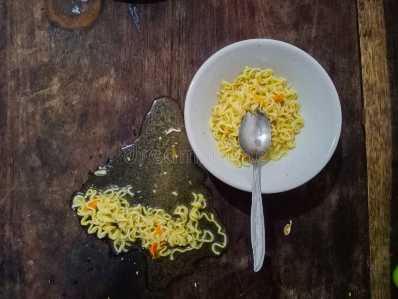 Noodle spill on the table stock image. Image of yellow - 230876633