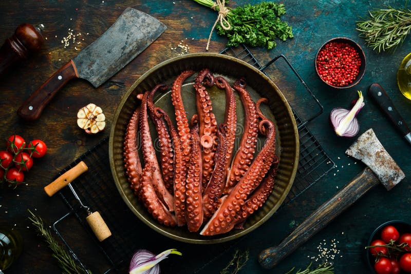 Boiled Octopus in a Round Metal Baking Dish. Seafood Stock Photo ...