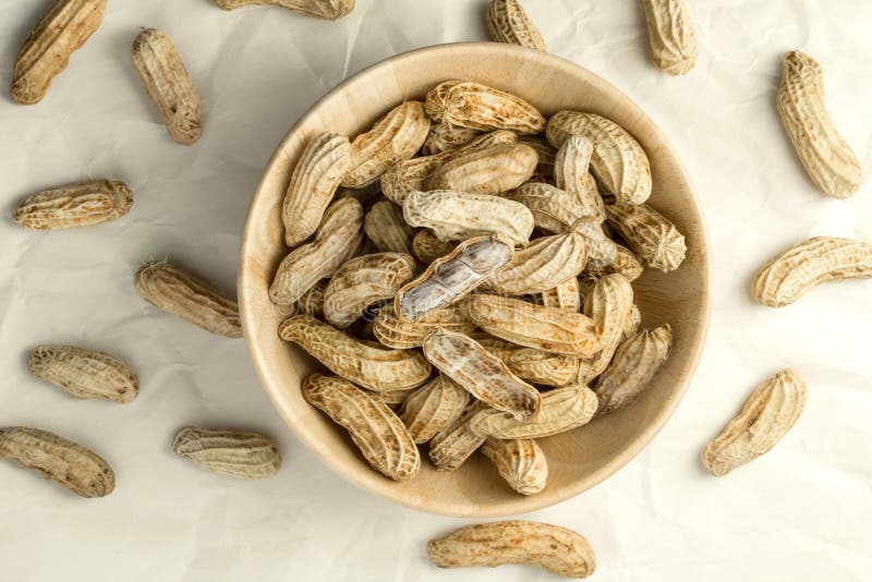 Boiled Peanuts in Wooden Cup on Crumpled Paper Stock Image - Image of ...
