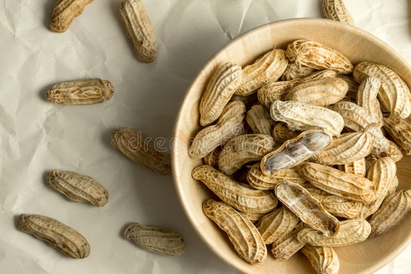 Boiled Peanuts in Wooden Cup on Crumpled Paper Stock Image - Image of ...
