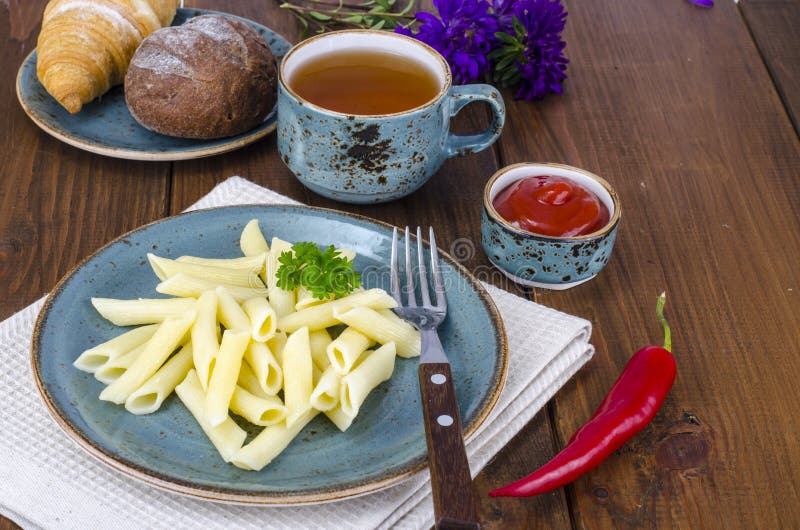 Boiled penne with ketchup stock photo. Image of close - 152956318