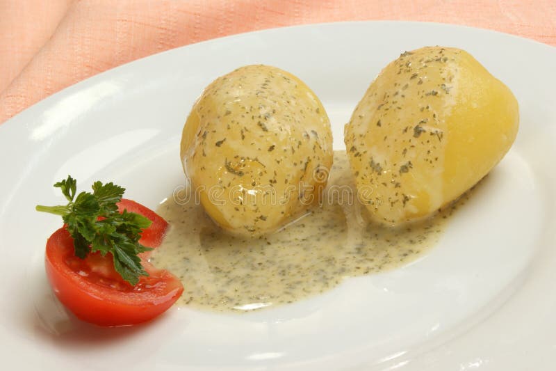 Boiled Potatoes with Parsley Sauce Stock Photo - Image of tomato ...