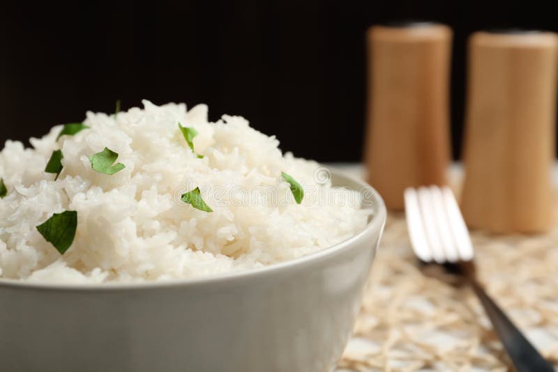Boiled Rice in Bowl on Table, Closeup. Stock Image - Image of nutrition ...