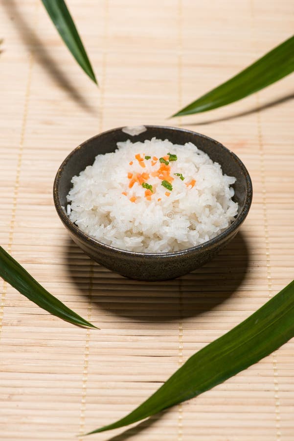 Boiled Rice in a Bowl on Wooden Table. Stock Photo - Image of ...
