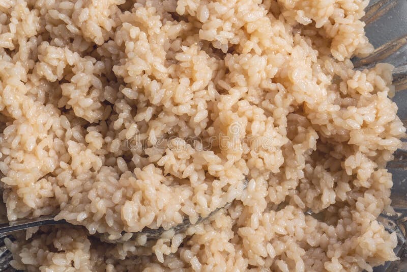 Boiled Rice Close Up As Background, Boiled Rice with Soy or Wine Sauce ...