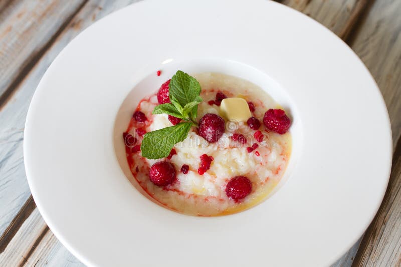 Boiled Rice with Raspberry in a Large Plate Stock Photo - Image of ...