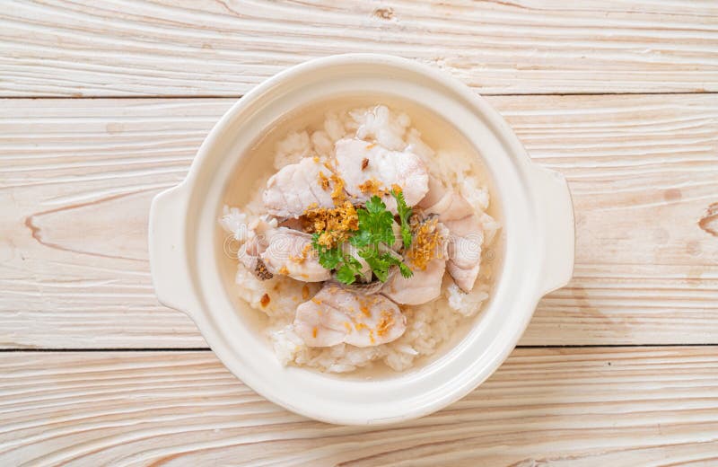 Boiled rice soup with fish stock image. Image of fish - 210066789