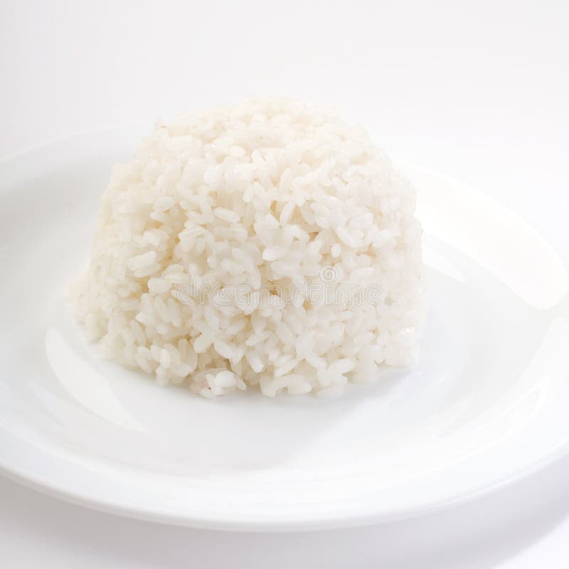 Boiled Rice on a White Plate on Wood Background Stock Photo - Image of ...