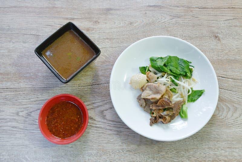 Boiled Slice Braised Beef and Meatball on Plate Dipping Spicy and Sour ... Boiled Slice Braised Beef and Meatball on Plate Dipping Spicy and Sour ...