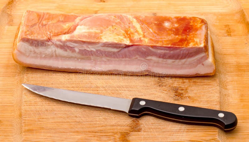 Boiled-Smoked Bacon with Knife Stock Photo - Image of cutting, board ...