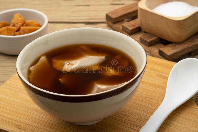 Boiled Soft Tofu Pudding (soy Bean Curd) in Ginger Juice Soup Stock ...