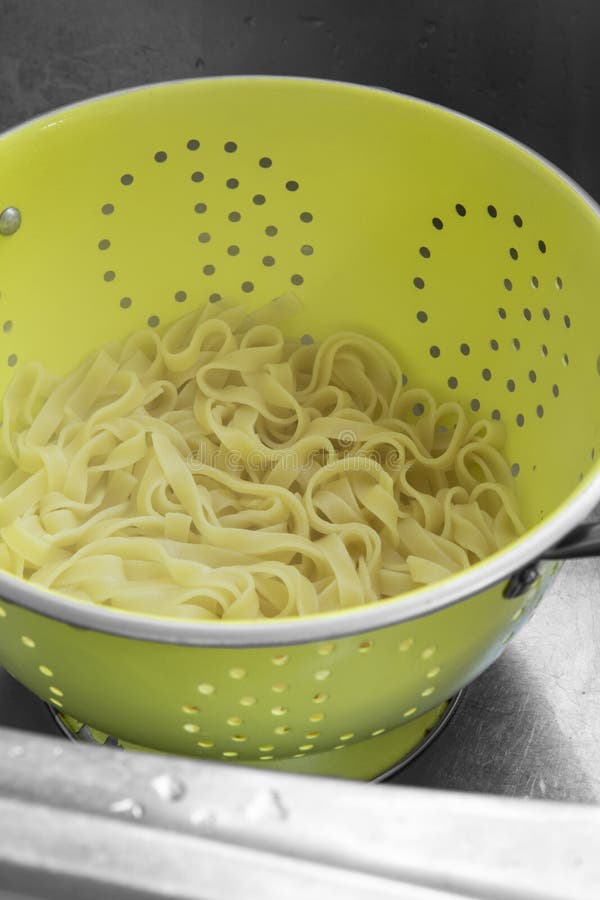 Boiled Tagliatelle Pasta Straining in a Colander Stock Photo - Image of ...