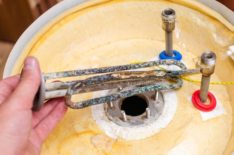 Boiler Repair, Replacement of Broken Water Heating Element Stock Photo ...