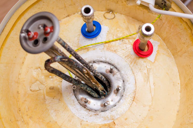 Boiler Repair, Replacement of Broken Water Heating Element Stock Image ...