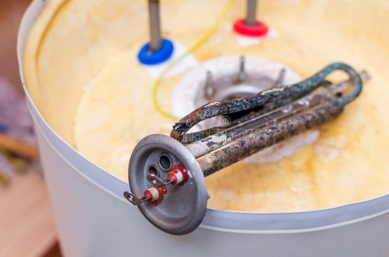 Boiler Repair, Replacement of Broken Water Heating Element Stock Image ...