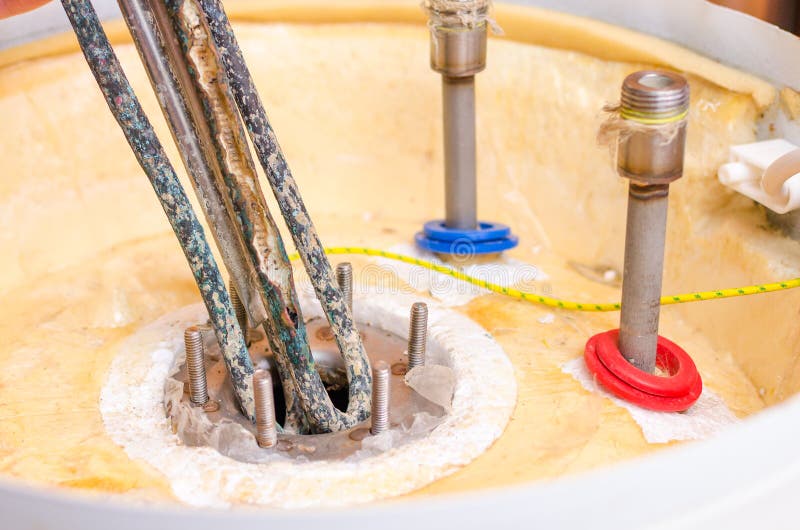 Boiler Repair, Replacement of Broken Water Heating Element Stock Image ...