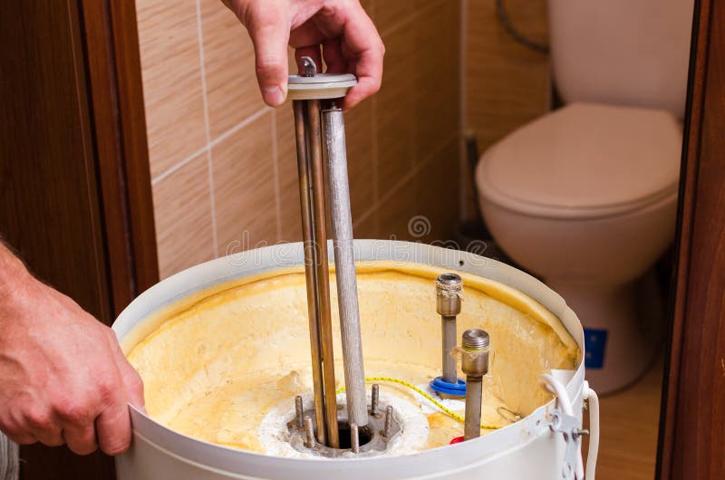 Boiler Repair, Replacement of Broken Water Heating Element Stock Image ...