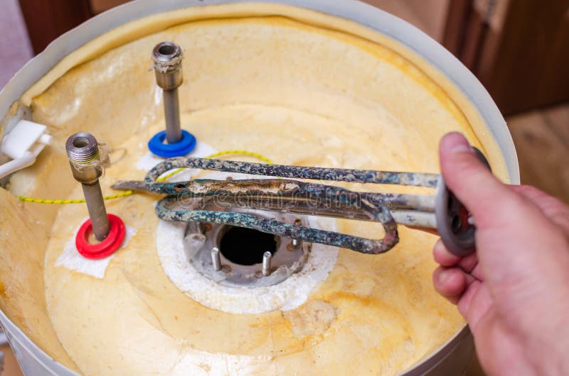 Boiler Repair, Replacement of Broken Water Heating Element Stock Image ...