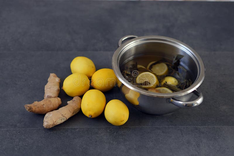 Boiling Lemon and Ginger Together in a Pot and Drinking, Lemon and ...