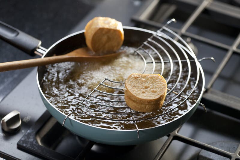 Boiling oil on the stove. stock image. Image of cook - 60859389