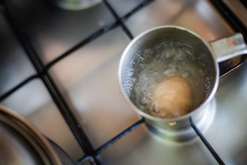 Boiling one egg stock photo. Image of organic, steam - 181941050