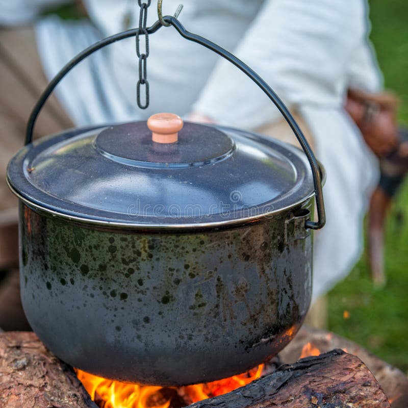 Boiling Tea with a Pot Over a Bushcraft Campfire. Primitive Survival ...