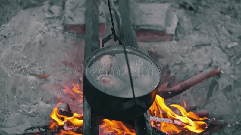 Boiling Potatoes, Campfire, Cooking Stock Footage - Video of kettle ...