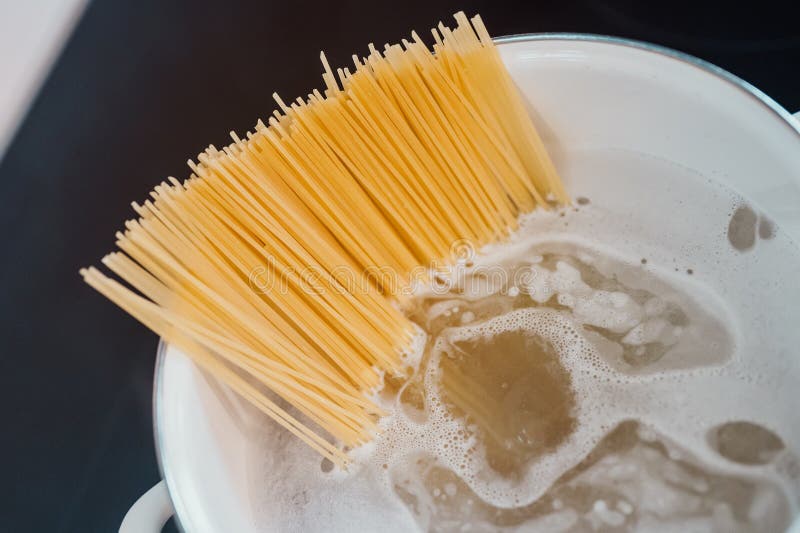 Boiling Spaghetti in White Pot with Bubbling Water Stock Image - Image ...