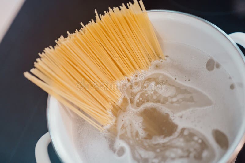 Boiling Spaghetti in White Pot with Bubbling Water Stock Photo - Image ...