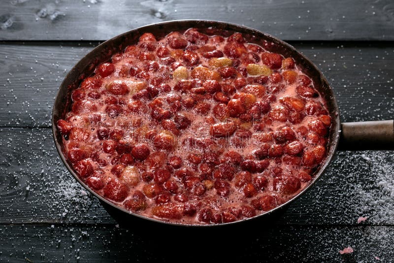 Boiling strawberry jam stock photo. Image of process - 73635826