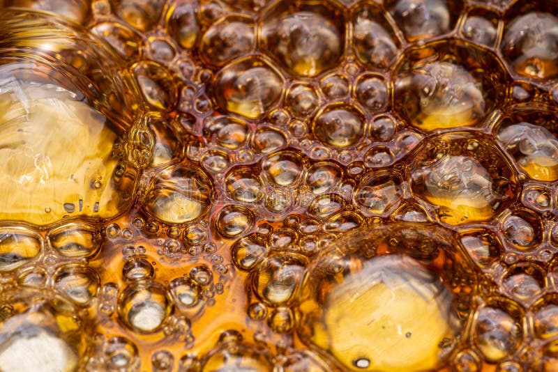 Boiling Sugar with Bubbles Turns into Caramel, Caramelization Stock ...