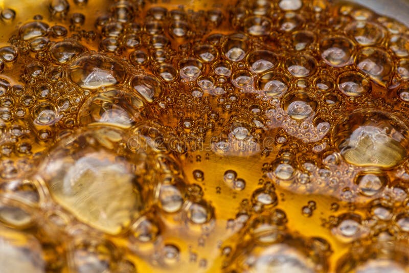 Boiling Sugar with Bubbles Turns into Caramel, Caramelization Stock ...