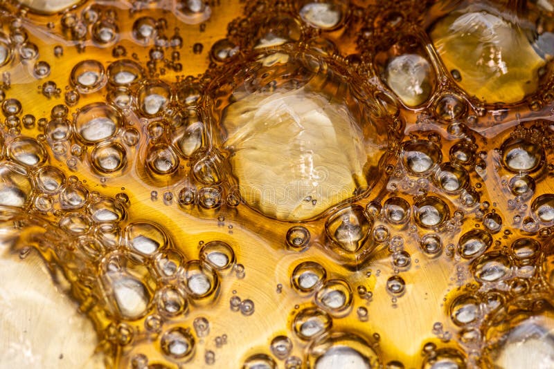 Boiling Sugar with Bubbles Turns into Caramel, Caramelization Stock ...