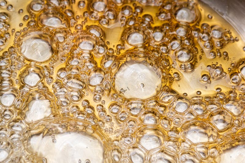 Boiling Sugar with Bubbles Turns into Caramel, Caramelization Stock ...