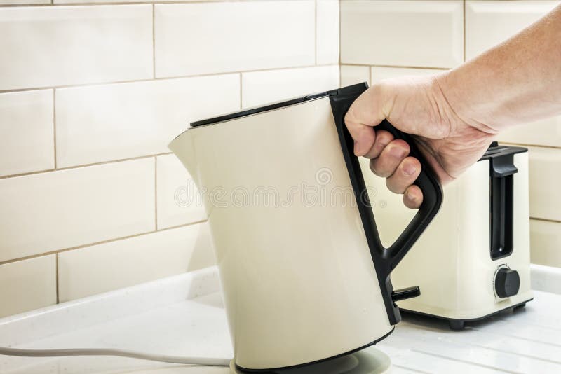 Kettle Boiling on a Gas Stove in the Kitchen Stock Photo - Image of ...